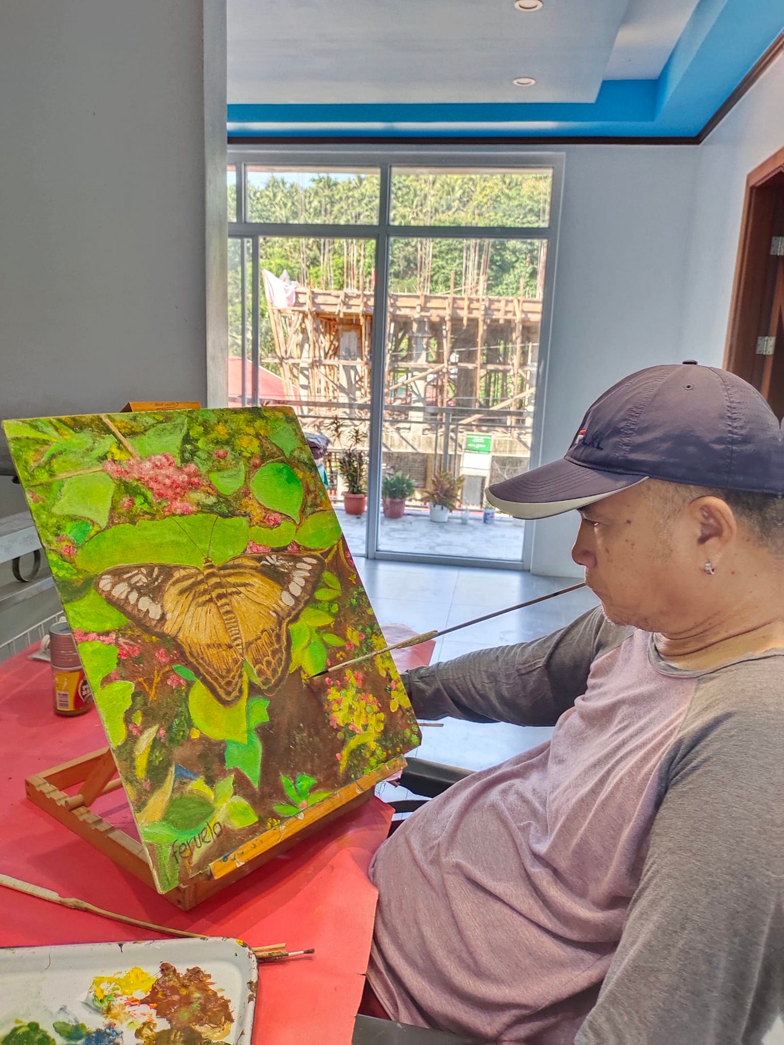 John Roland Feruelo | Professional Mouth Painter and Artist